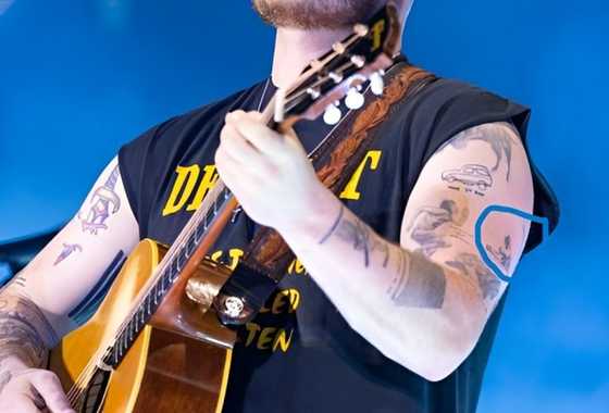 The top 15 Zach Bryan's tattoos and their meanings explained - YEN.COM.GH