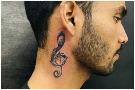 25 best neck tattoos for men: Cool and modern neck tattoo designs - YEN ...